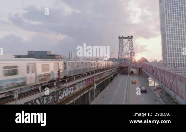 Aerial view of the subway crossing The Williamsburg Bridge. Shot on a ...