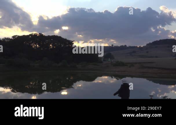 Exploring rural Mexico while wearing traditional hats by the serene ...
