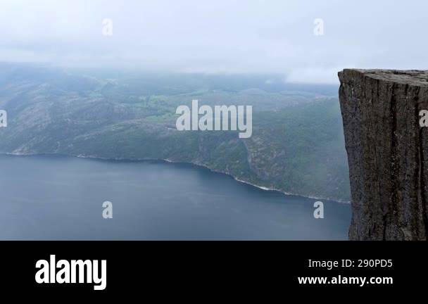 Breathtaking beauty of Preikestolen Norway as towering cliffs rise ...