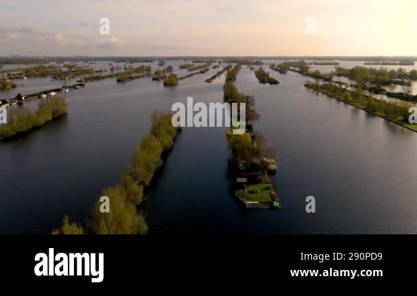 Witness the serene beauty of the Netherlands unique waterways as they ...