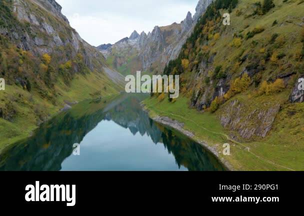 Experience the serene beauty of Falensee Lake in Switzerland, where ...