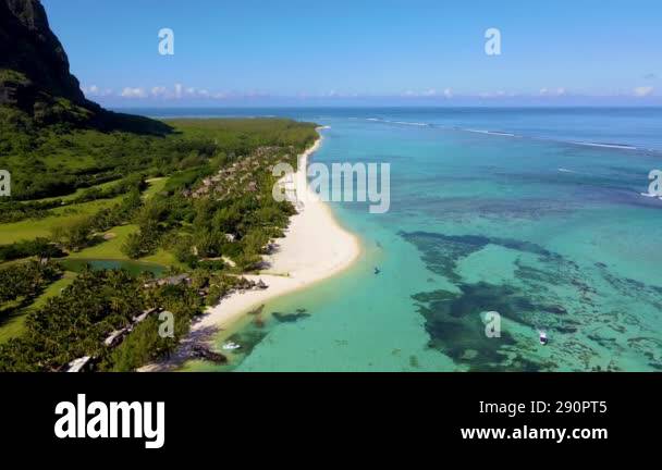 Experience the stunning natural beauty of Mauritius, where golden sands ...