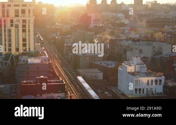 Aerial view of a subway train on an elevated railway track in Brooklyn ...