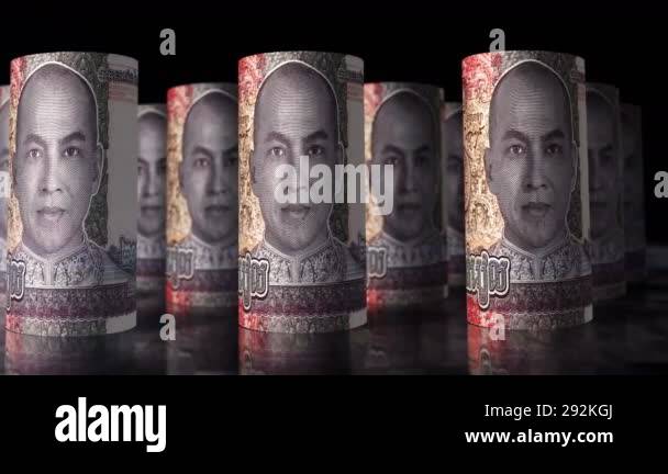 Cambodia money Cambodian riel rolls loop 3d. Camera moving in front of ...