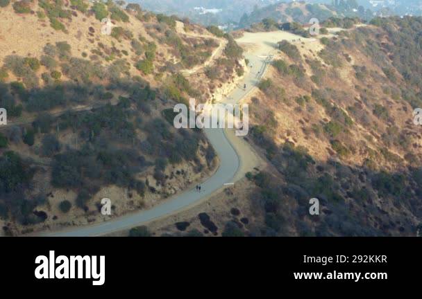 Aerial perspective of a winding trail in Runyon Canyon Park, featuring ...