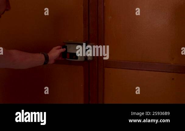 A door being opened to a street view Stock Video Footage - Alamy