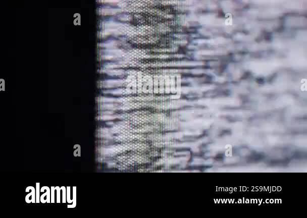 A retro CRT TV screen filled with static noise gradually transitions ...