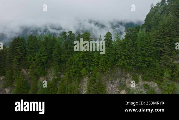 A breathtaking aerial view of mountain valleys with traditional ...