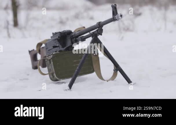 Soldier takes a light machine gun on a mission. A special forces group ...