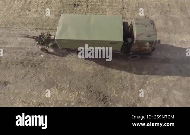 Air defense, anti-aircraft gun. Military truck carries a ZU-23-2 anti ...