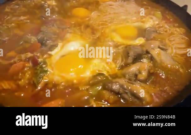Pot where ramen is being cooked in the traditional style Stock Video ...