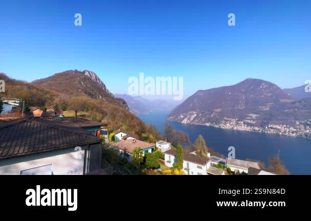 Panoramic view of the scenic curved Lake Lugano, Monte San Salvatore ...