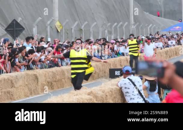 Boys jump ramp with homemade car. Red Bull Crazy Car Race Stock Video ...