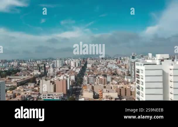 sunny summer day Lima city riverside business block aerial panorama 4k ...