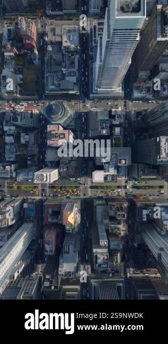 Vertical panoramic view showcases a bustling Manhattan intersection in ...