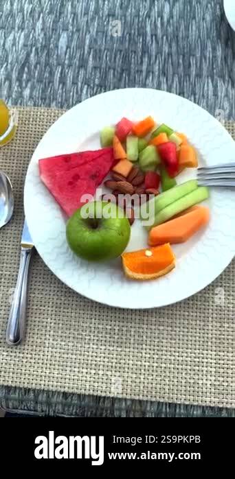 Breakfast featuring fresh fruits and nuts, breakfast highlighting ...