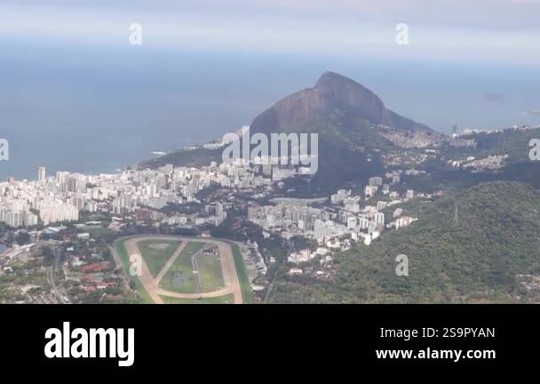 The view of densely packed houses and high-rise buildings as seen from ...