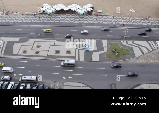 Traffic on the road in front of Copacabana Beach in Rio de Janeiro ...