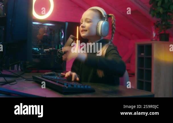 Emotional little girl gamer difficult hard streaming typing keyboard ...