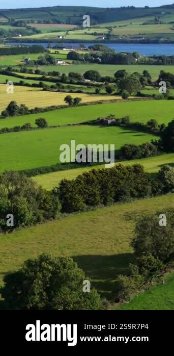 Explore beautiful green landscapes and serene waters in the countryside ...