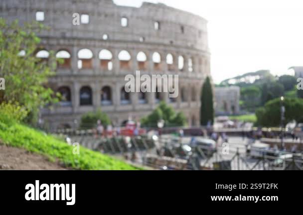 Defocused image capturing the iconic colosseum in rome, italy, with ...