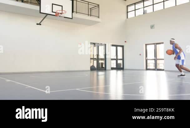 Practicing dribbling skills, athlete focused and determined on ...