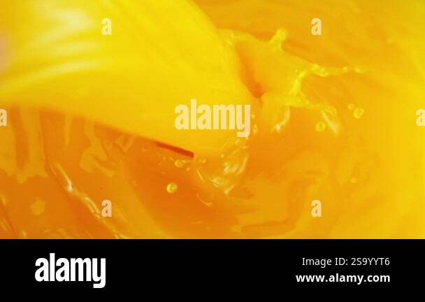Super Slow Motion Detail Shot of Pouring Fresh Orange Juice at 1000fps ...