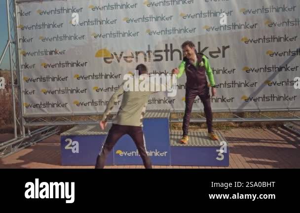 Award ceremony with athletes receiving medals at a sporting event Stock ...