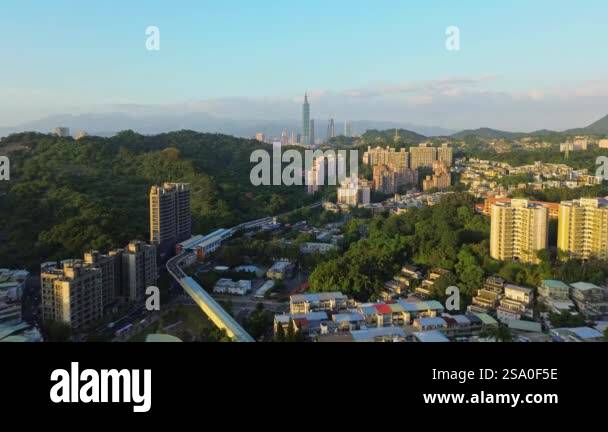 Aerial 4K footage of Taipei skyline with Taipei public transportation ...