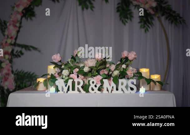 The charming Mr Mrs sign, beautifully surrounded by exquisite pink and ...