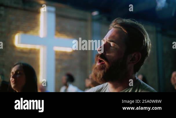 Bearded man deeply immersed in prayer during spiritual worship ...
