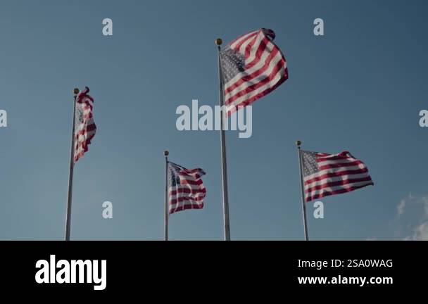 A magnificent and stunning array of American flags is waving proudly ...