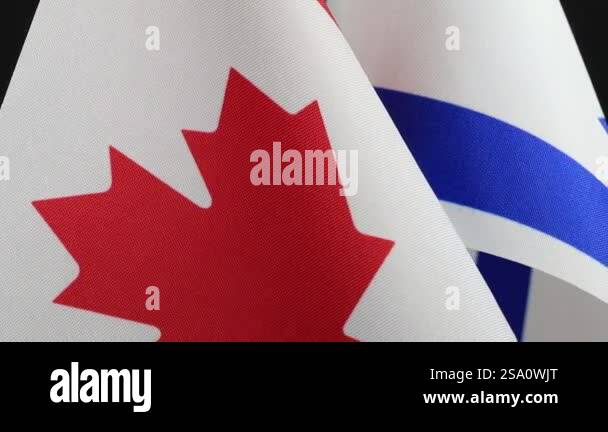 Israeli and Canadian flags side by side, gently waving in harmony Stock ...