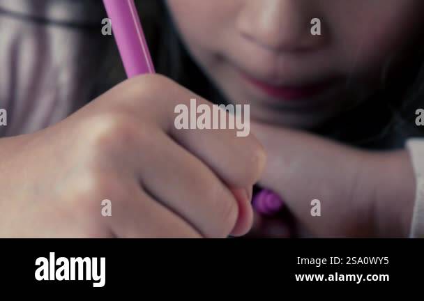 Concentrated Child Drawing with Coloring Pen - Tight Face Close-up. A ...
