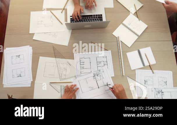Architect write construction detail blueprint. Engineer watch data ...