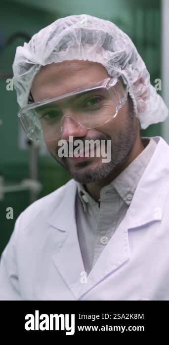 Portrait of a man scientist in uniform working in curative laboratory ...