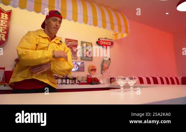 Attractive restaurant worker prepare for serving food for customer ...