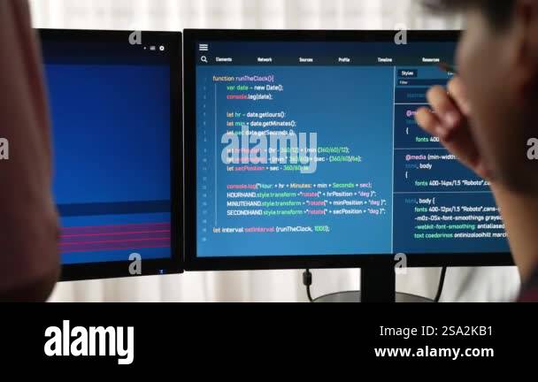 Slow motion back end software developer engineer for computer programming working together on ...