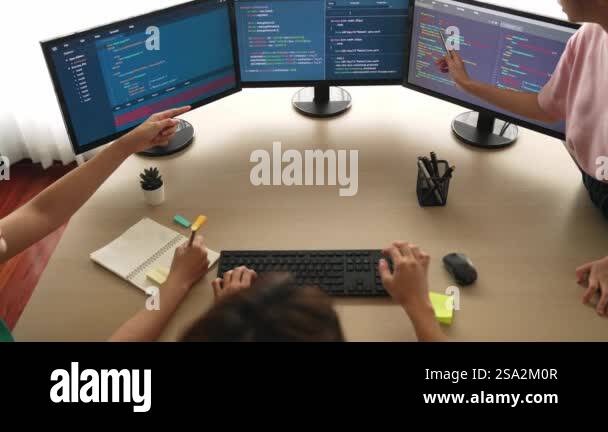 Slow motion back end software developer engineer for computer programming working together on ...