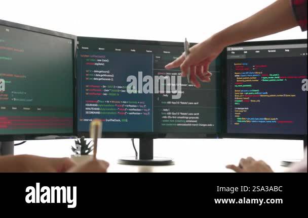 Slow motion back end software developer engineer for computer programming working together on ...