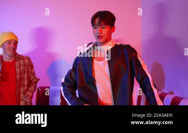 Asian break dancer perform freestyle movement and jumping at party with ...