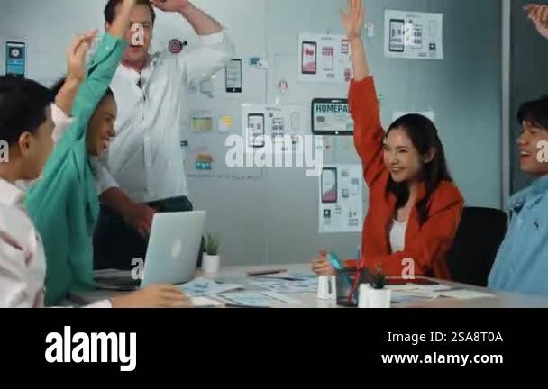 Group of successful business team putting hand together at meeting ...