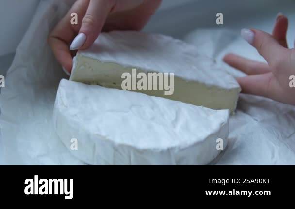Rotating Camembert cream cheese, close-up, dairy product concept ...