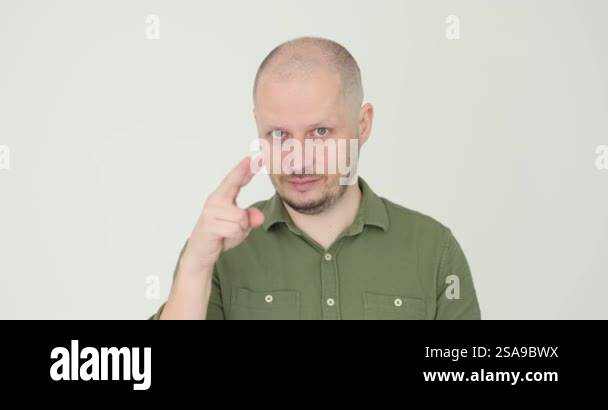 Man confidently gesturing look me in the eyes gesture on white ...