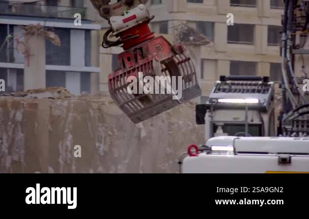 France, Bordeaux 01.20.2025, Building demolition excavator with ...