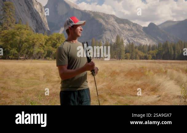 Man stands in awe of Yosemite National Parks breathtaking scenery ...