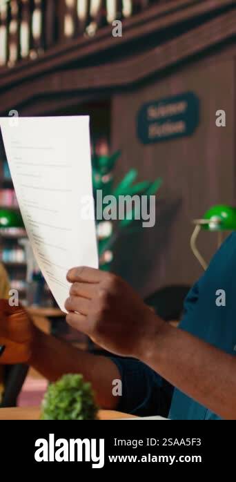 Vertical Video Black student rehearsing lines from the script for drama ...