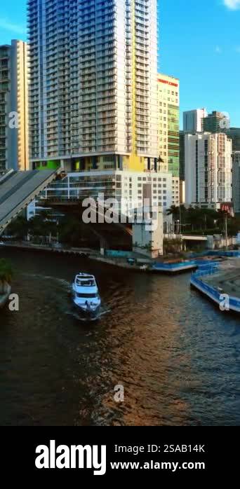 Yacht sailing under the drawbridge and another motor boat approaches ...