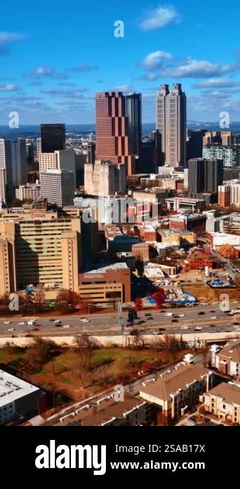 Beautiful view of Atlanta downtown with busy wide road going around ...