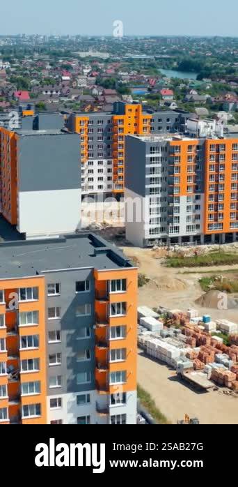New city complex. Tall urban apartment buildings with colorful walls ...